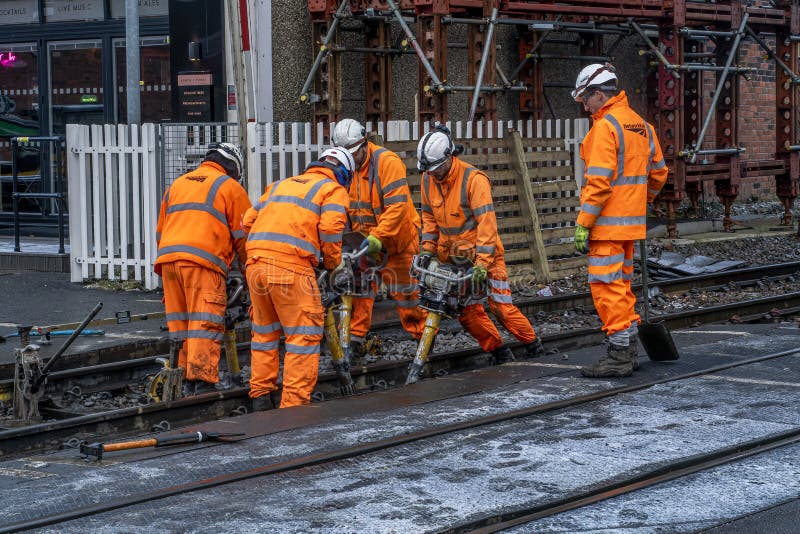 Group of Railway Workers Working on a Level Crossing in Bamber Bridge ...