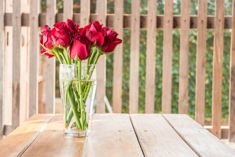 Group of Red Roses on Wooden Table Stock Image - Image of holiday, rose ...