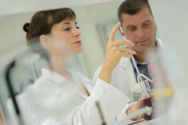 Group Researchers during Work in Laboratory Stock Image - Image of ...