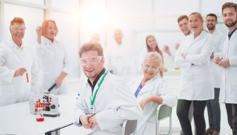 Group of Researchers at the Workplace in the Laboratory. Stock Image ...