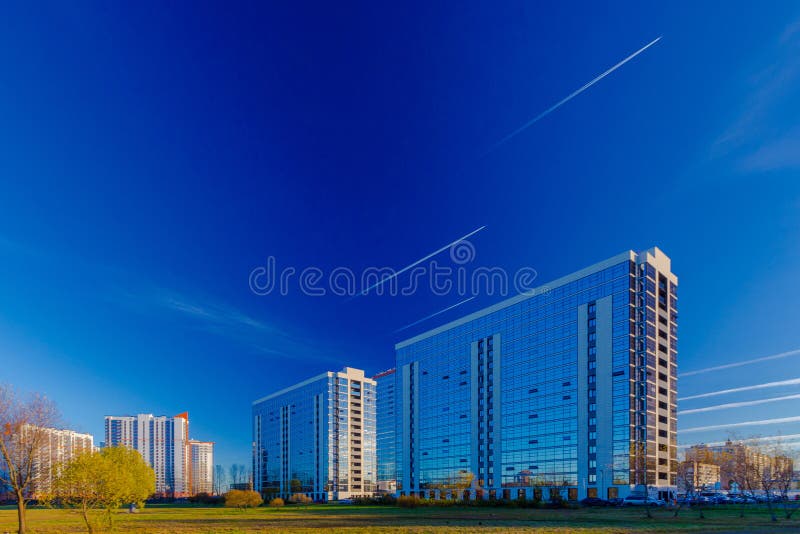 A Group of Residential Buildings in a Park Stock Photo - Image of ...