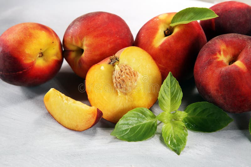 A Group of Ripe Peaches on Table Stock Photo - Image of table, summer ...
