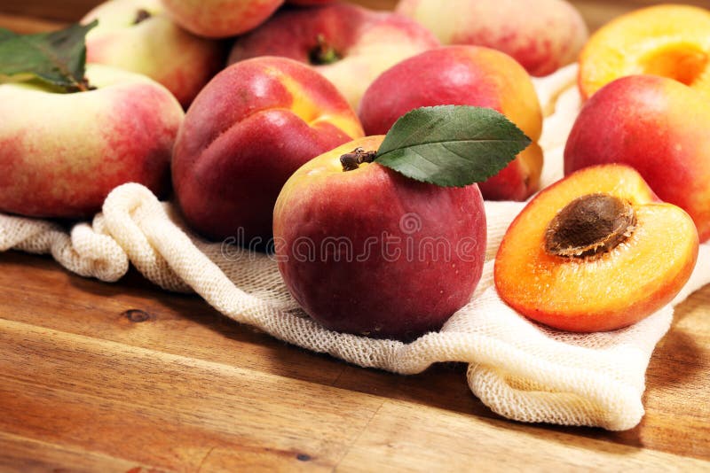 A Group of Ripe Peaches on Table Stock Image - Image of yellow, fresh ...