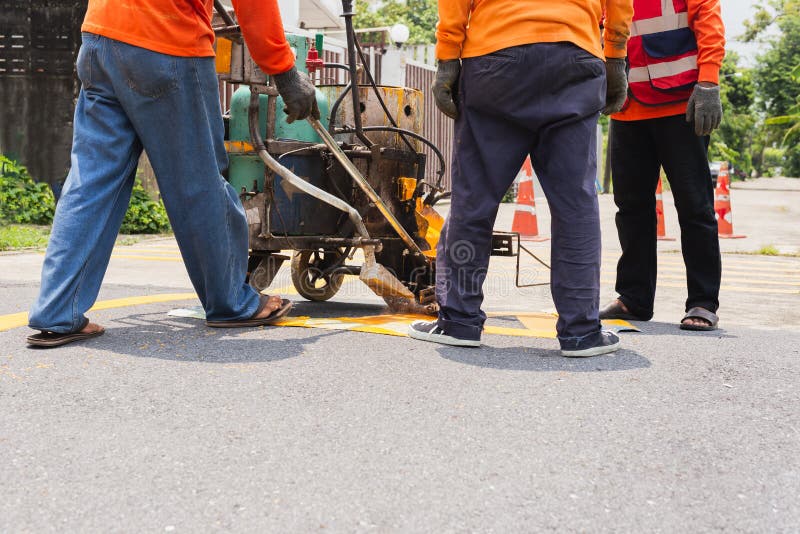Group of Road Worker Paint Traffic Lines on Asphalt Road Surface. Stock ...