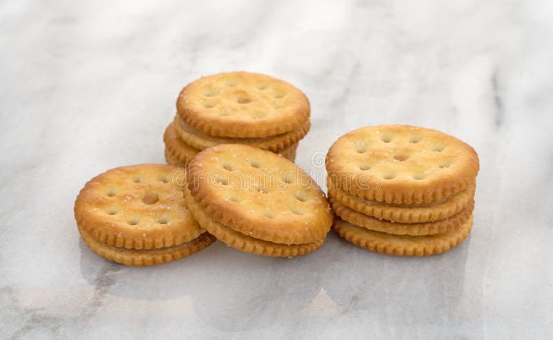 Group of Roasted Peanut Butter Crackers on a Marble Table Stock Photo ...