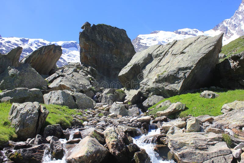 Group of rocks in mountain stock photo. Image of valley - 74639798