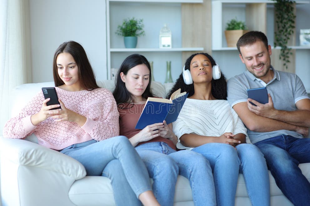 Group of Roommates at Home Enjoying Different Hobbies Stock Image ...