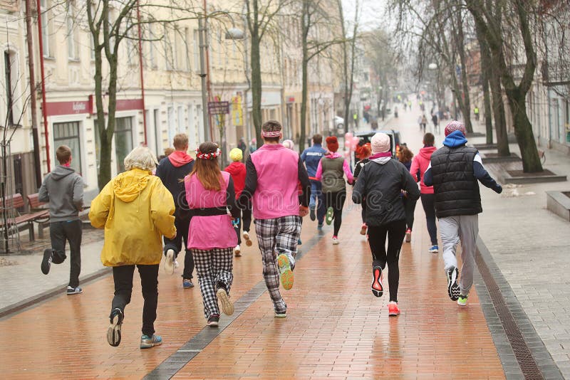 Group of running people editorial stock photo. Image of reflection ...