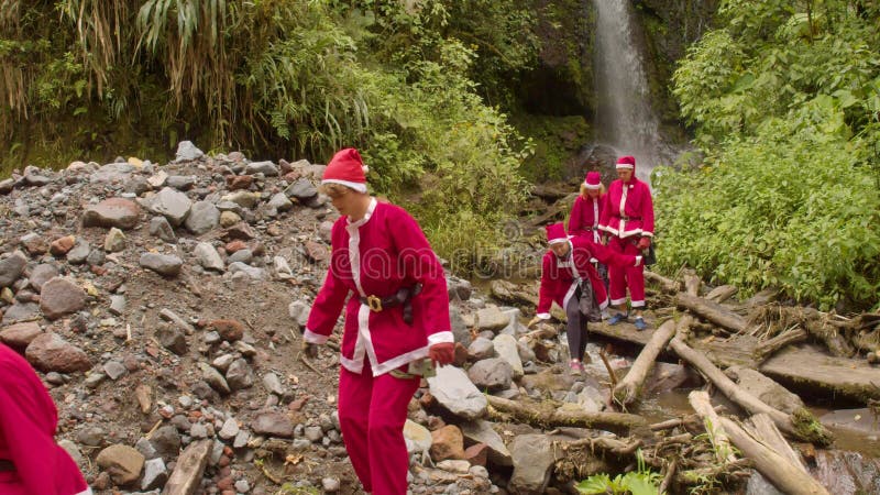 Scared Santa Claus Hiking stock footage. Video of waterfall - 162827470