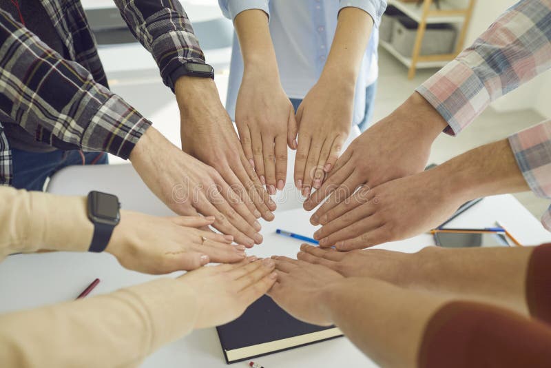 Group of School or College Students Join Hands Showing Their Unity and ...