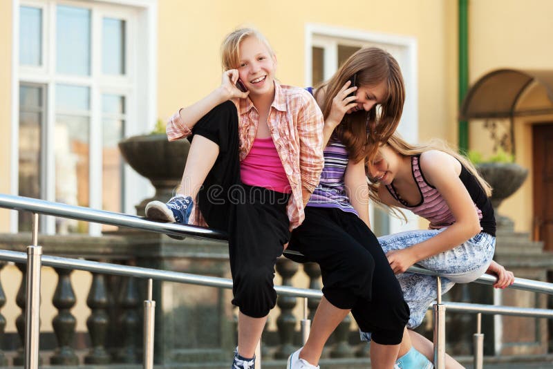 Group of Teen Girls Calling on the Cell Phones Stock Photo - Image of ...