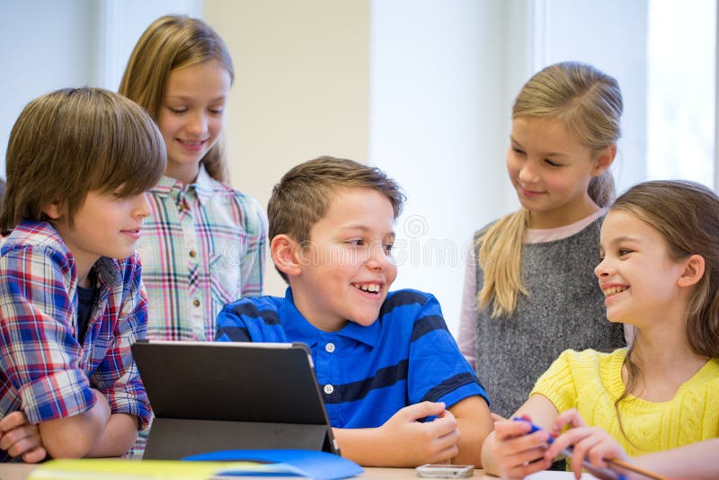 Group of School Kids with Tablet Pc in Classroom Stock Photo - Image of ...