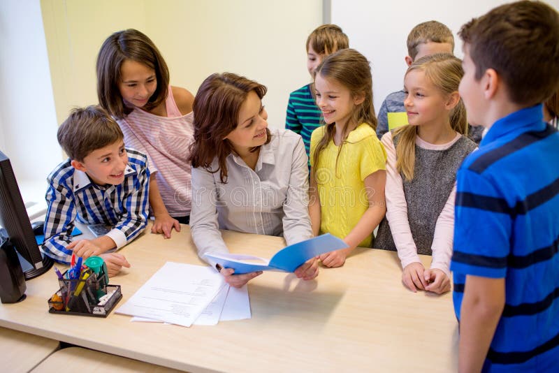 Group of School Kids with Teacher in Classroom Stock Photo - Image of ...