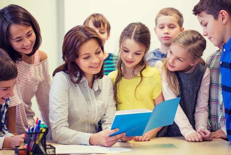 Group of School Kids with Teacher in Classroom Stock Image - Image of ...