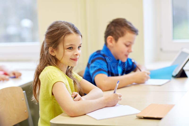 Students Writing a Test in School Concentrating Stock Photo - Image of ...
