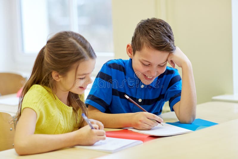Group of School Kids Writing Test in Classroom Stock Image - Image of ...
