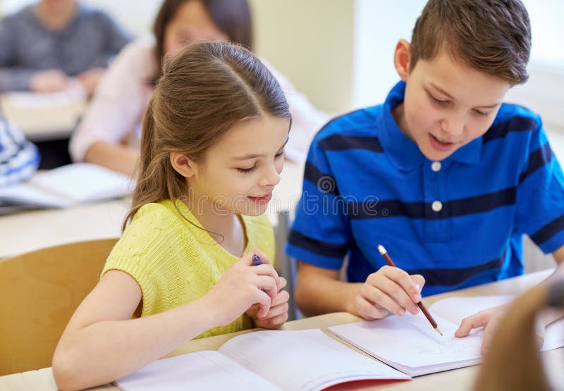 Group of School Kids Writing Test in Classroom Stock Photo - Image of ...