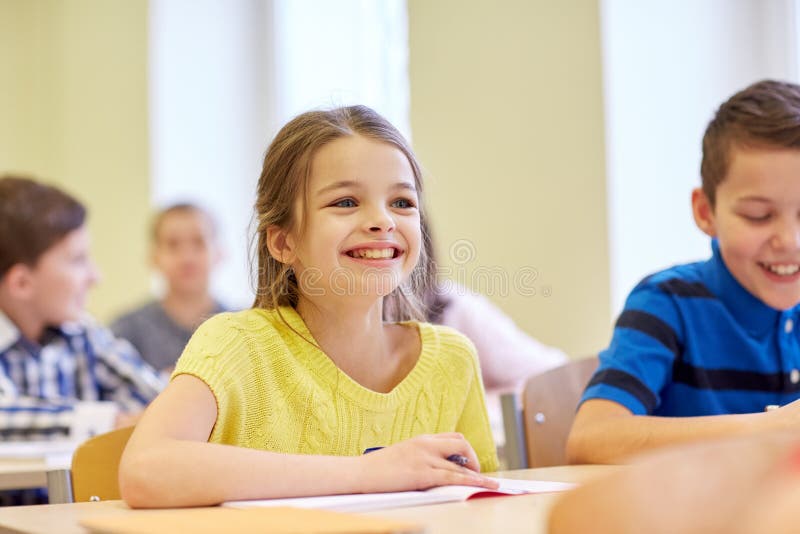 Group of School Kids Writing Test in Classroom Stock Photo - Image of ...