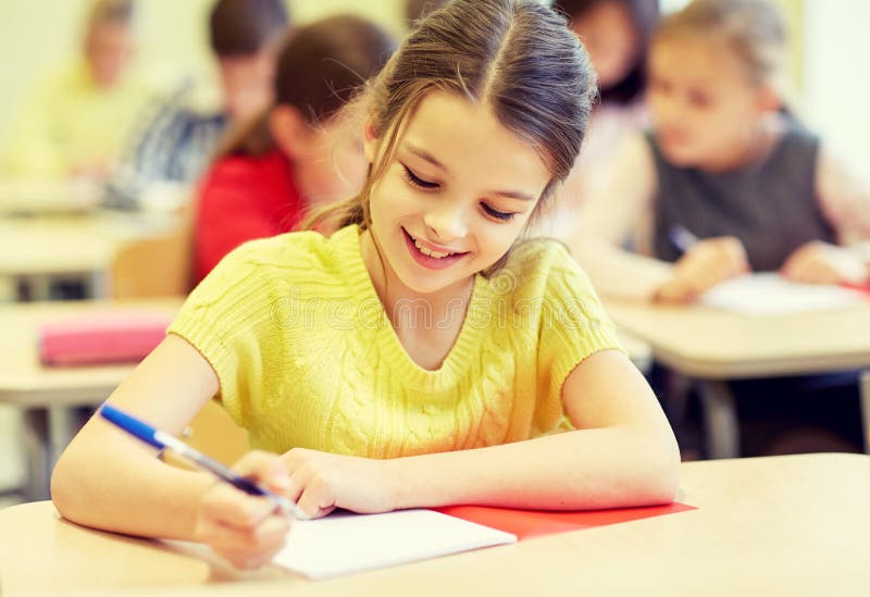 Group of School Kids Writing Test in Classroom Stock Photo - Image of ...