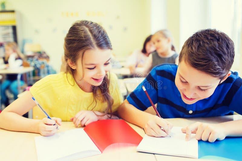 Group of School Kids Writing Test in Classroom Stock Image - Image of ...