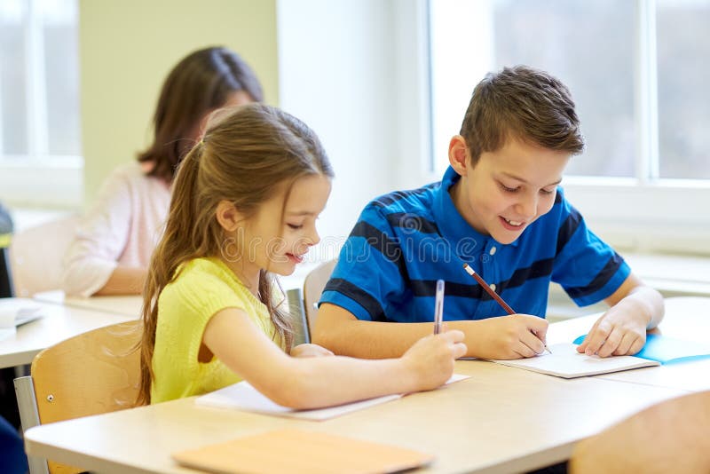 Group of School Kids Writing Test in Classroom Stock Image - Image of ...