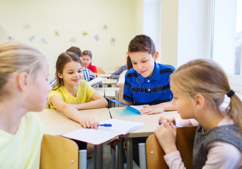 Group of School Kids Writing Test in Classroom Stock Photo - Image of ...