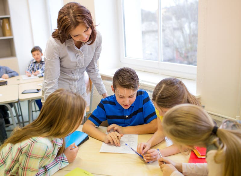 Group of School Kids Writing Test in Classroom Stock Photo - Image of ...