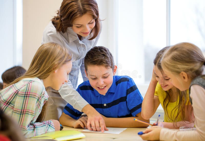Group of School Kids Writing Test in Classroom Stock Photo - Image of ...