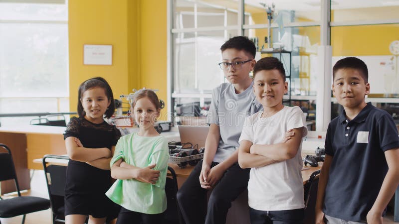 Group of Schoolchildren Staying, Posing for Camera and Smiling in ...