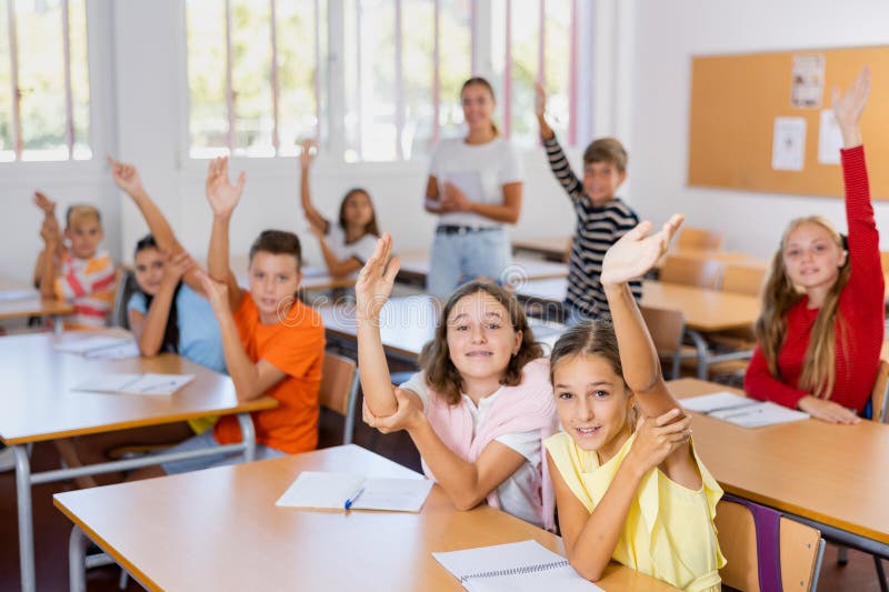 Group of Schoolkids Hands Together during Lesson in Classroom Stock ... Group of Schoolkids Hands Together during Lesson in Classroom Stock ...