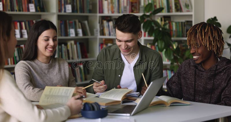 Group of Schoolmates Studying Together in Library Stock Video - Video ...