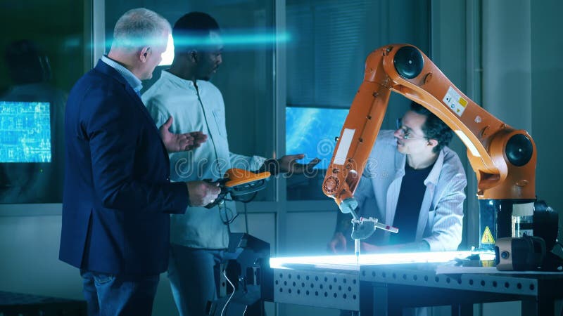 Group of Science Workers Discussing Industrial Robot. Teamwork Concept ...