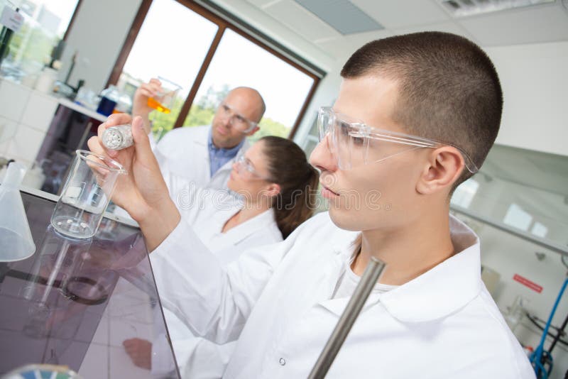 Group Scientists Conducting Research in Lab Stock Image - Image of ...