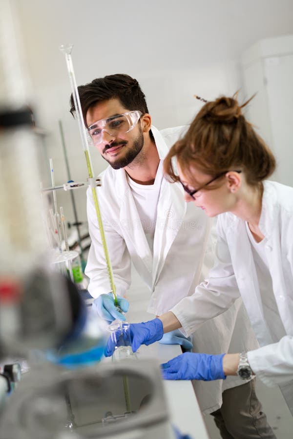 Group of Scientists Working at Laboratory Stock Photo - Image of ...