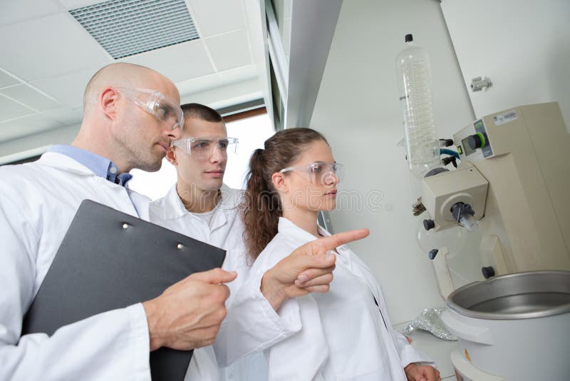 Group Scientists Working at Laboratory Stock Photo - Image of data ...