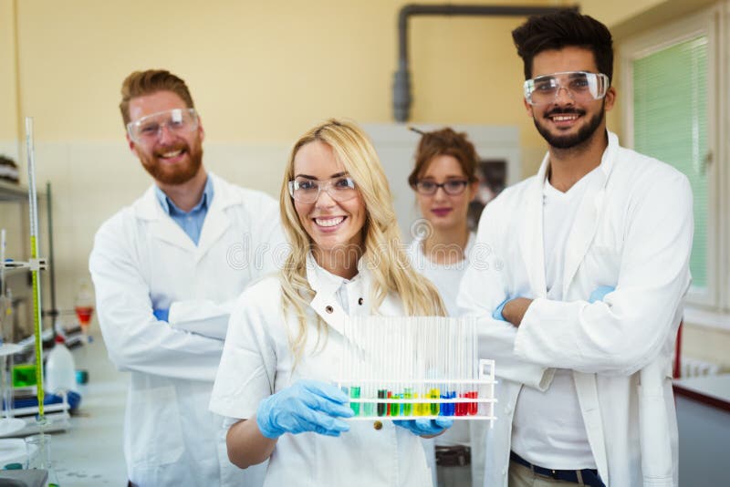Group of Scientists Working at Laboratory Stock Photo - Image of ...