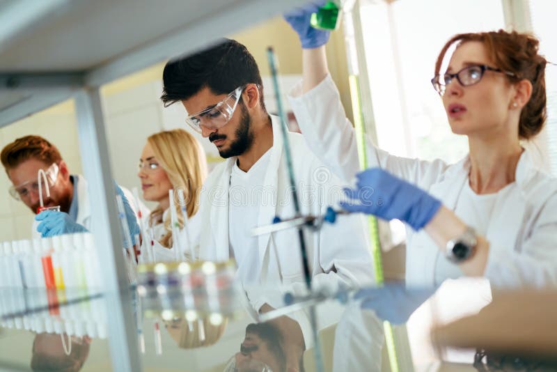 Group of Scientists Working at Laboratory Stock Image - Image of ...