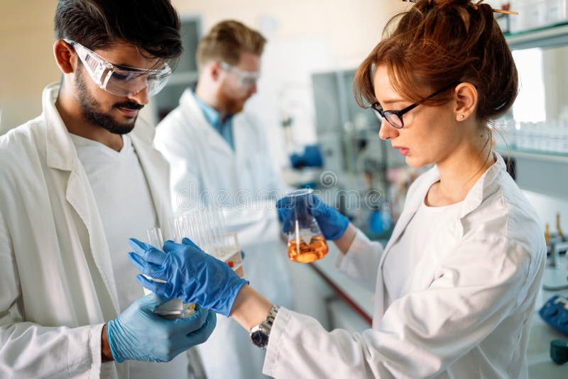 Group of Scientists Working at Laboratory Stock Image - Image of ...