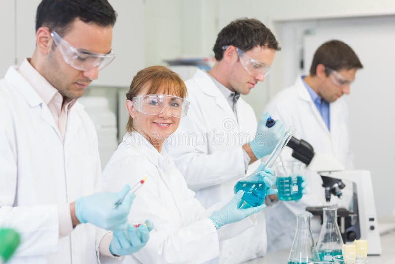 Group of Scientists Working at the Laboratory Stock Photo - Image of ...