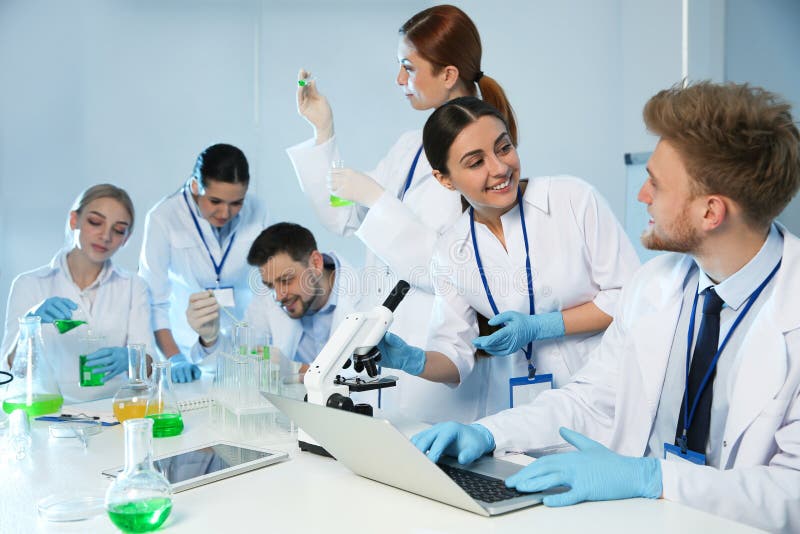 Group of Scientists Working in Chemistry Laboratory Stock Image - Image ...