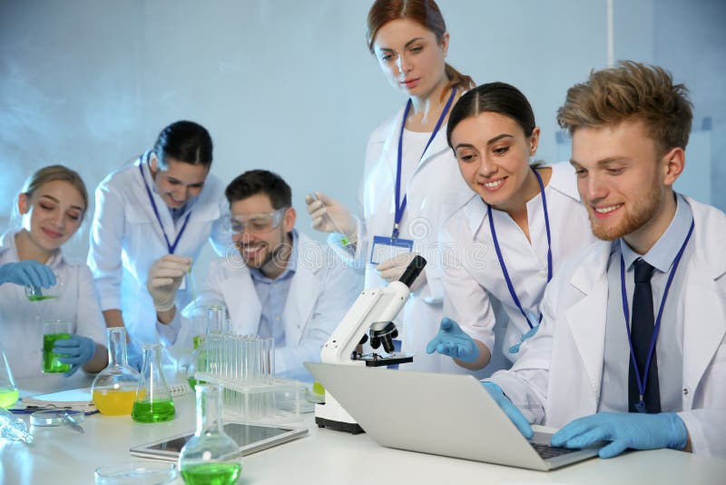 Group of Scientists Working in Modern Laboratory Stock Image - Image of ... Group of Scientists Working in Modern Laboratory Stock Image - Image of ...