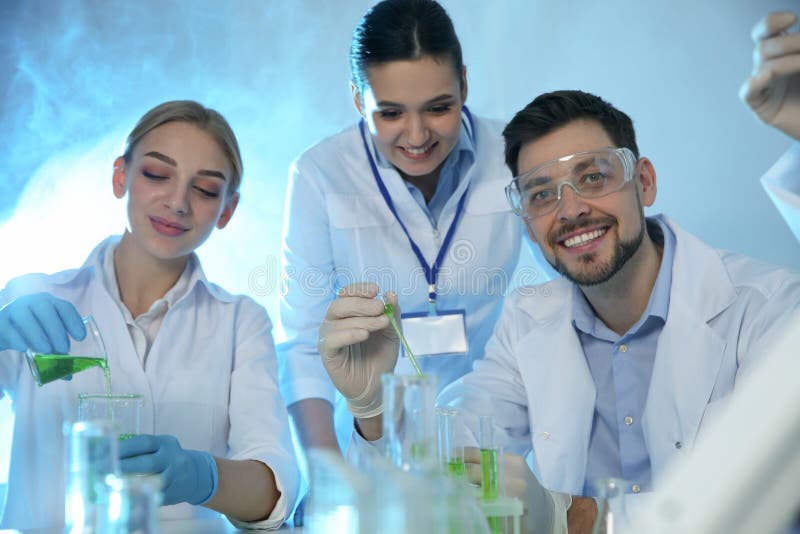 Group of Scientists Working in Chemistry Laboratory Stock Image - Image ...