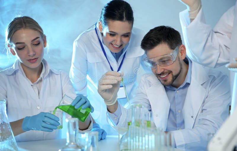 Group of Scientists Working in Chemistry Laboratory Stock Image - Image ...