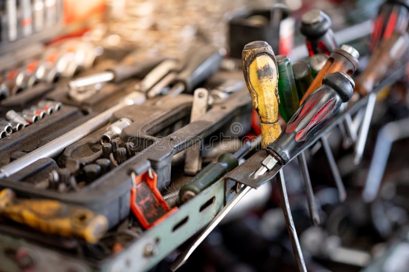 Screwdrivers and Other Work Tools on Workbench in Garage Stock Photo ...