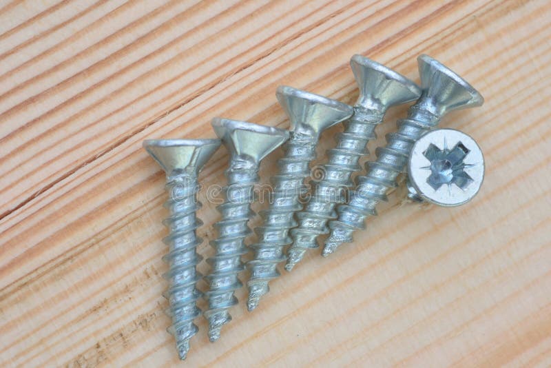 Group of screws on wood stock image. Image of home, hardware - 46866327