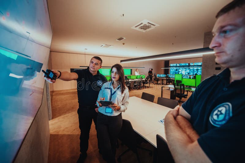 Group of Security Data Center Operators Working in a CCTV Monitoring ...