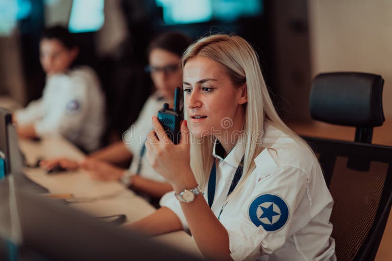 Group of Security Data Center Operators Working in a CCTV Monitoring ... Group of Security Data Center Operators Working in a CCTV Monitoring ...
