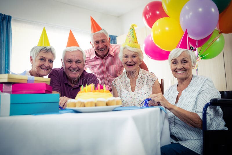 Group of Seniors Celebrating a Birthday Stock Photo - Image of elderly ...