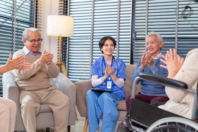 Group of Seniors Clapping Hands in a Retirement Home Stock Photo ...