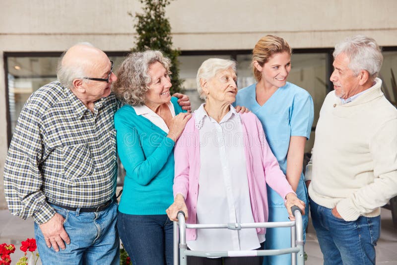 Group of Seniors in Conversation with Geriatric Nurse Stock Image ...